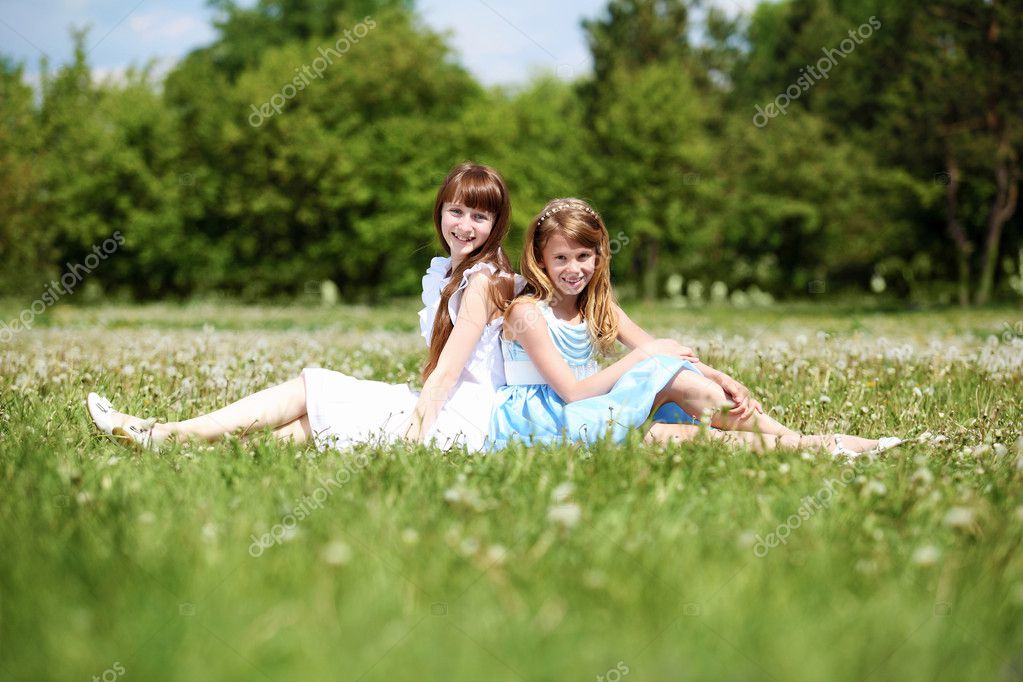 Two girls playing in the park — Stock Photo © SergeyNivens #5877554