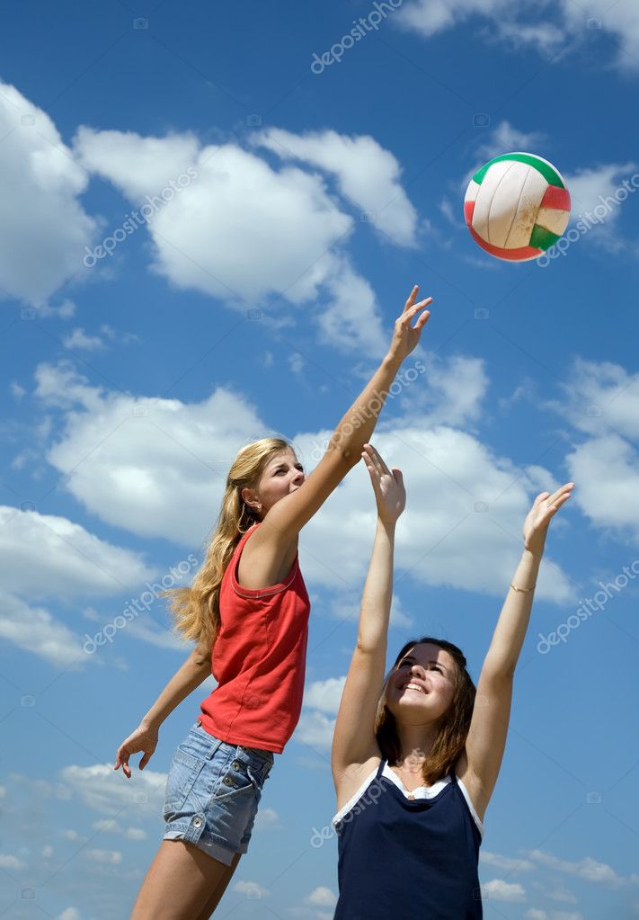 Girls playing volleyball — Stock Photo © Jim_Filim #6068090