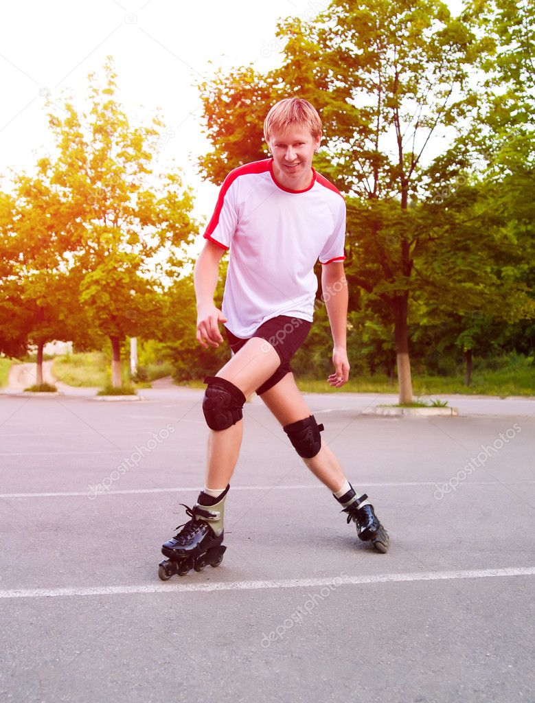 Young active roller blade skater ⬇ Stock Photo, Image by © tan4ikk #6124888