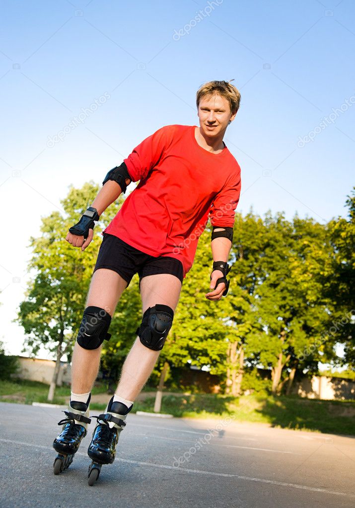 Young active roller blade skater — Stock Photo © tan4ikk #6406132