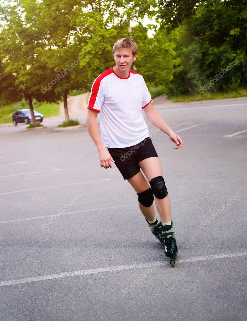 Young active roller blade skater — Stock Photo © tan4ikk #6406155