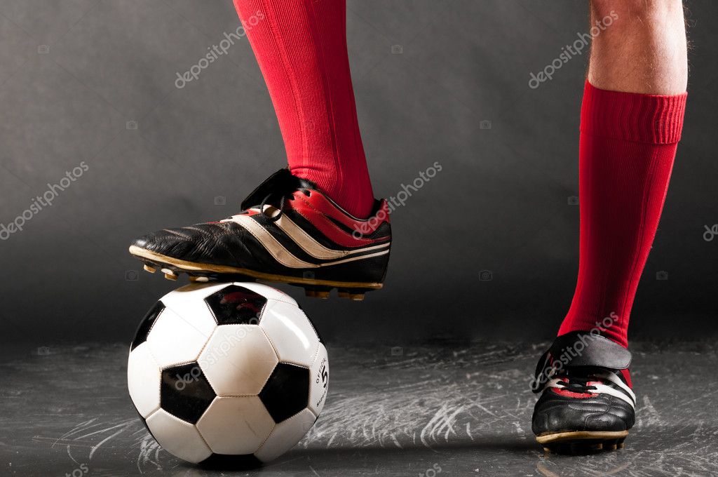 Legs of soccer player Stock Photo by ©sergeypeterman 5613237