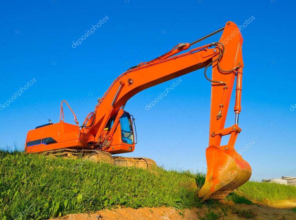 Big orange excavator — Stock Photo © Trinity #5415586