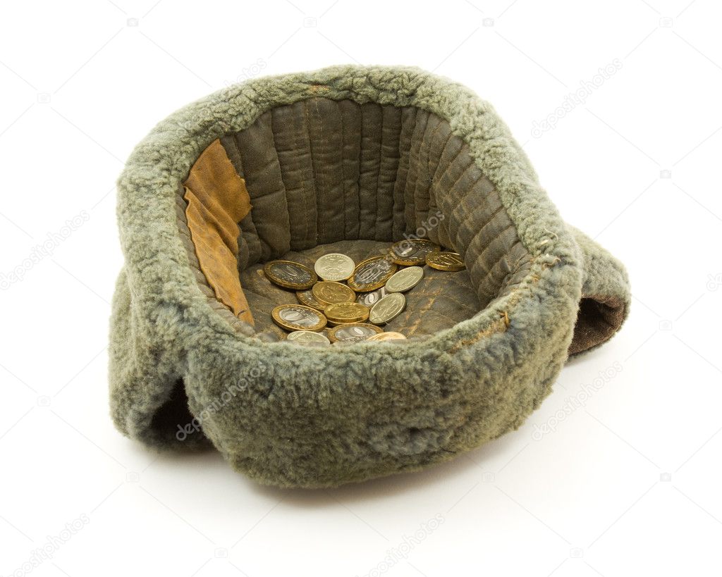 Coins in an old hat Stock Photo by ©khamidulin 5465947