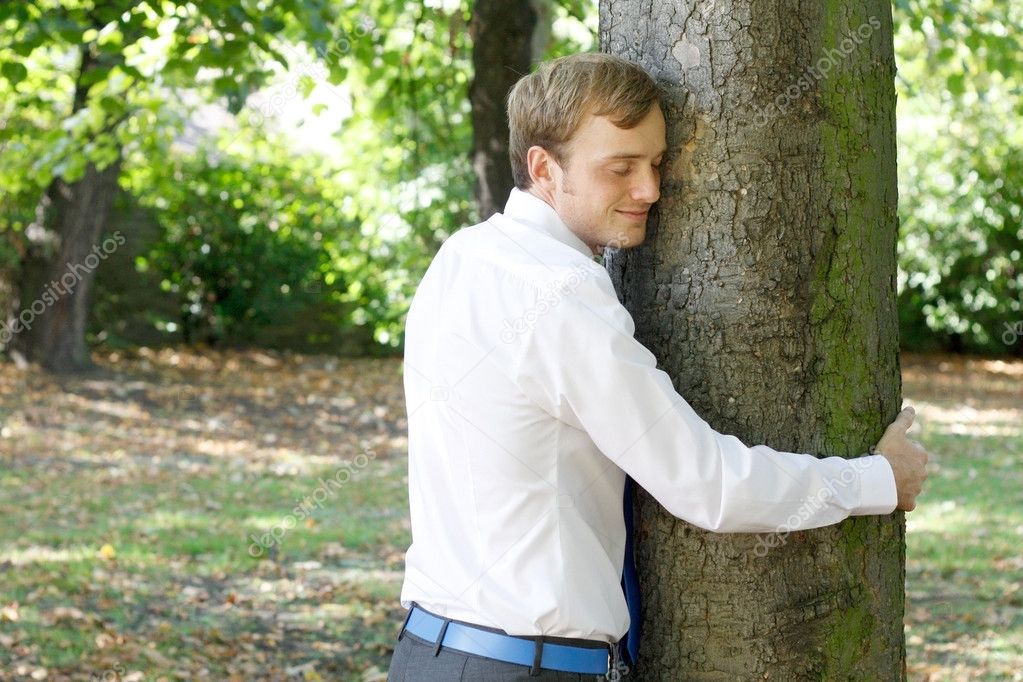 Man Hugging Tree