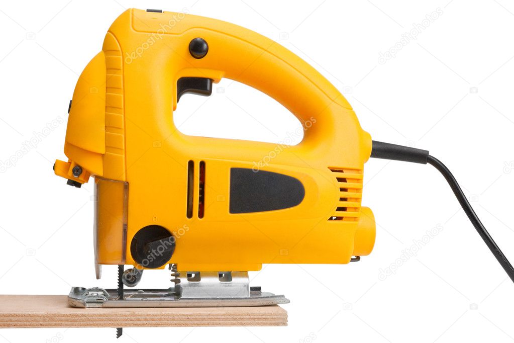 Jig saw to saw a piece of wood Stock Photo by ©AlexAvich 6042231