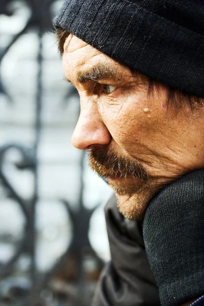 Homeless winter frozen face Stock Photo by ©vilevi 9181074