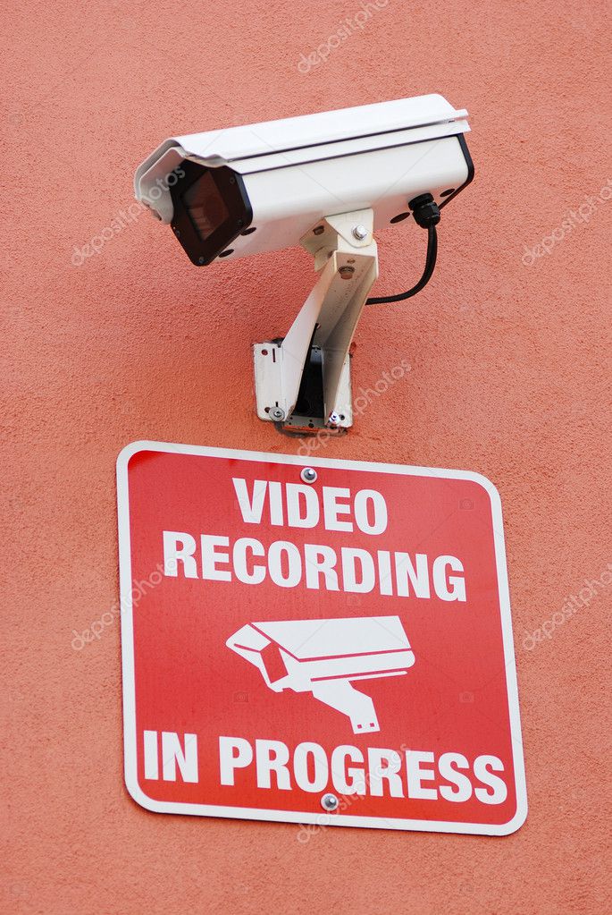 Security / surveillance camera with the warning sign — Stock Photo ...