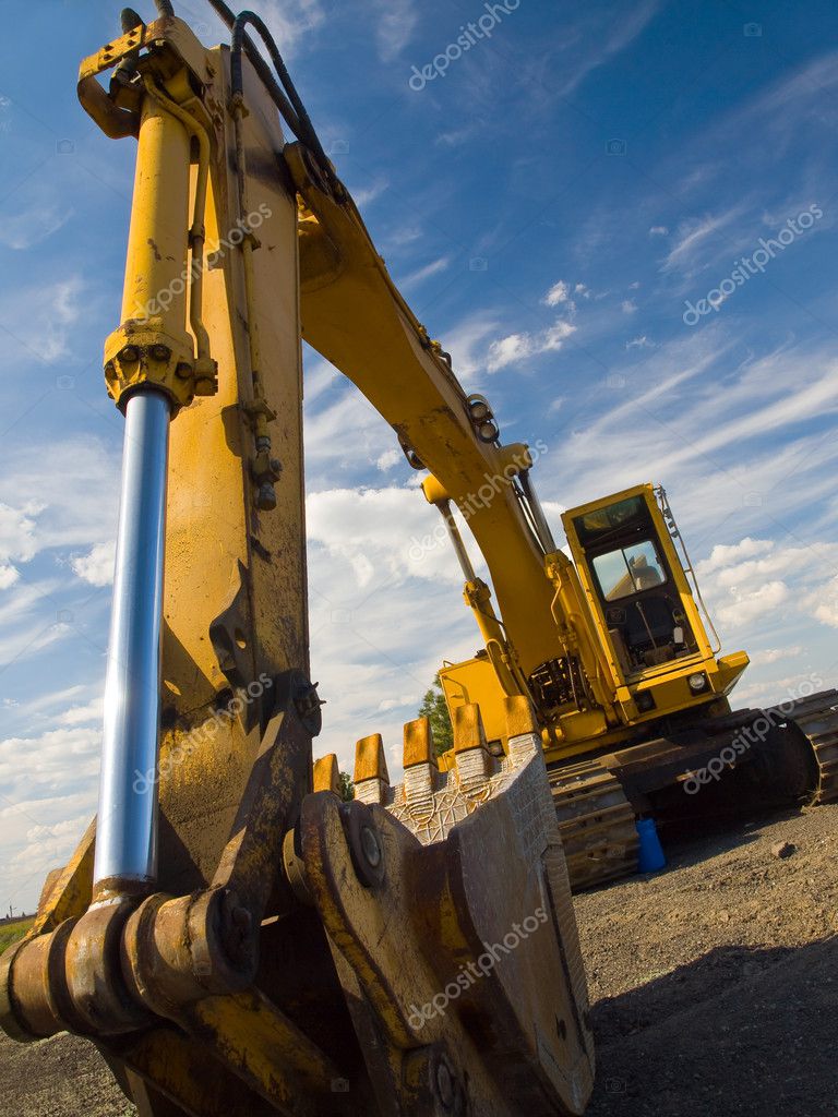 Heavy Duty Construction Equipment Parked at Worksite Stock Photo by ...
