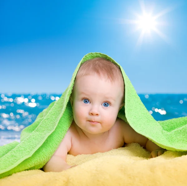 Adorable happy baby in colorful towel — Stock Photo © Andrey_Kuzmin ...