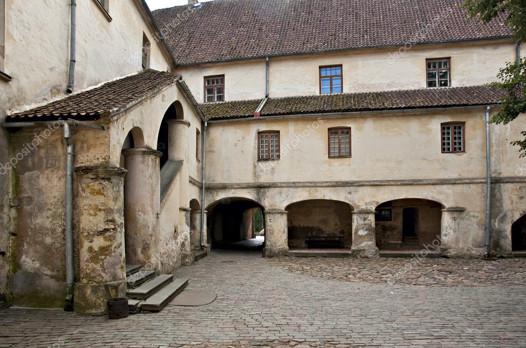 Medieval castle courtyard. — Stock Photo © MartinsL #6336892