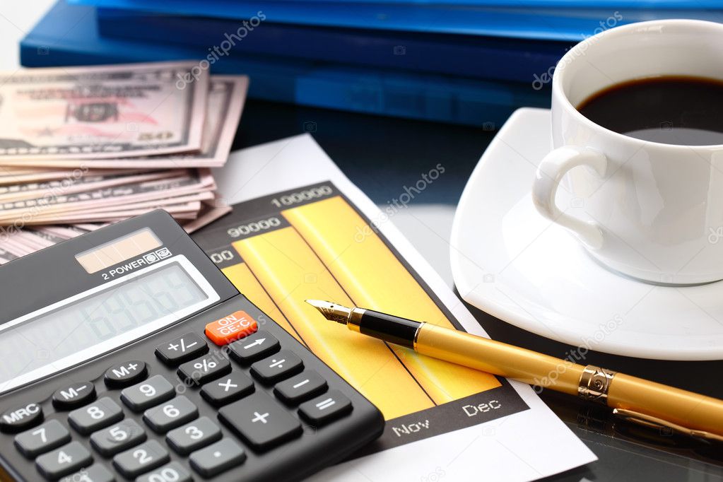 Graphs and charts on the table Stock Photo by ©VIZAFOTO 5632601