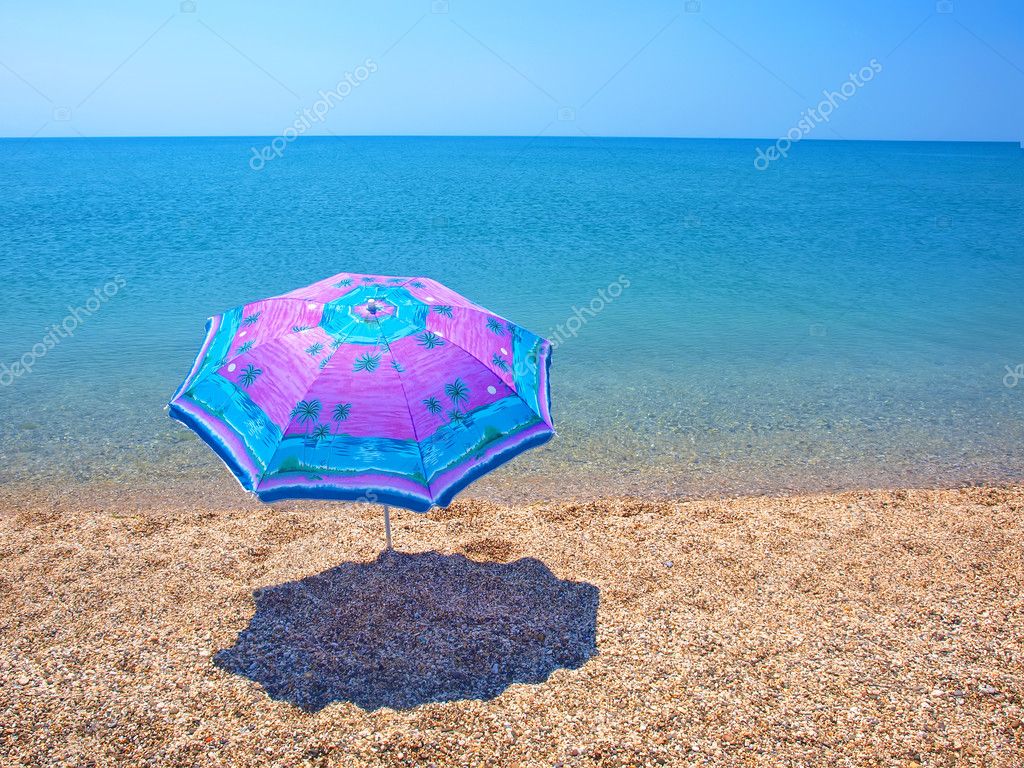 Beach umbrella, sea and sky — Stock Photo © island #5986274