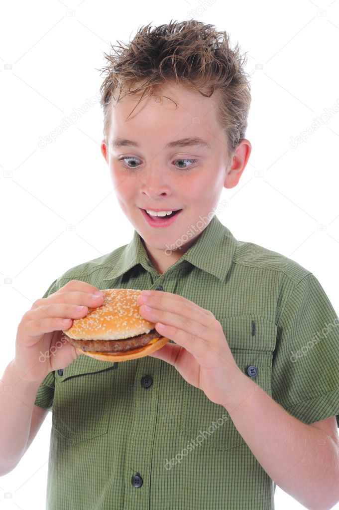 Little boy eating a hamburger — Stock Photo © Lebval #5935941