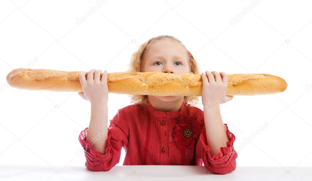 Girl biting a French bread Stock Photo by ©anatols 5759729