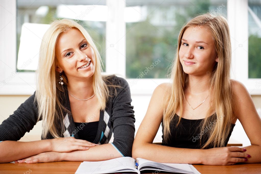 Portrait of a young group of students paying attention in class ...