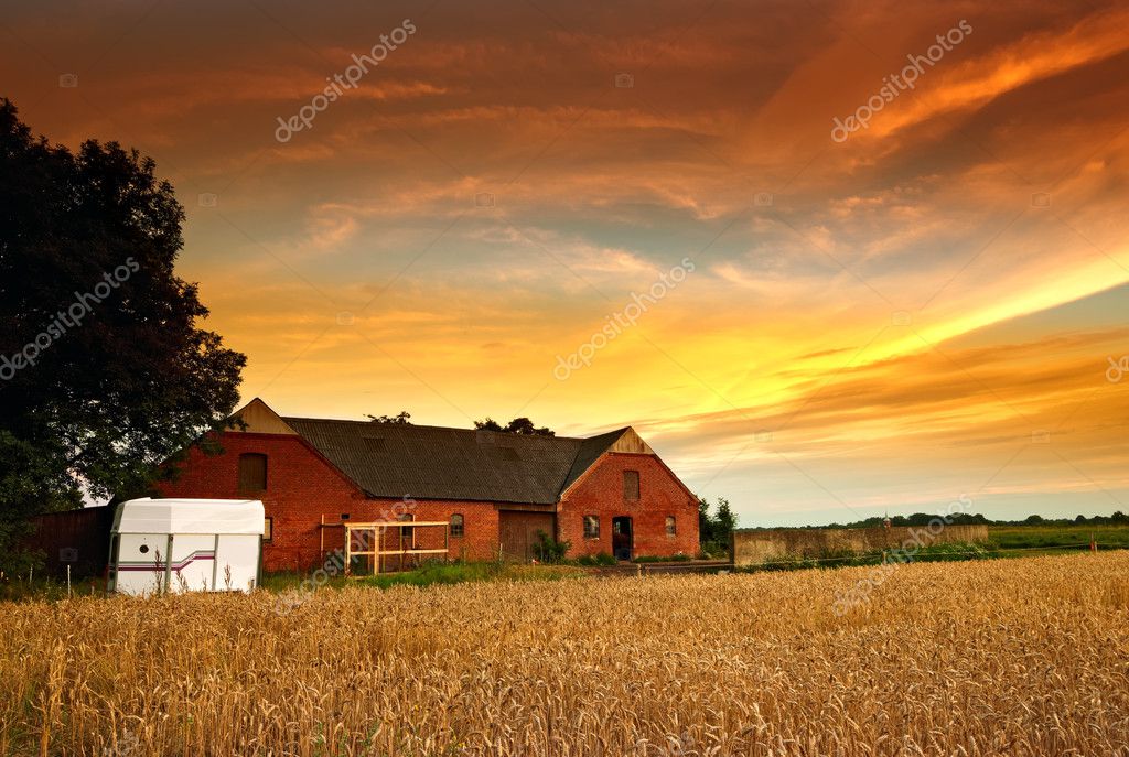 Old farmhouse in sunset — Stock Photo © Dhoxax #6547346