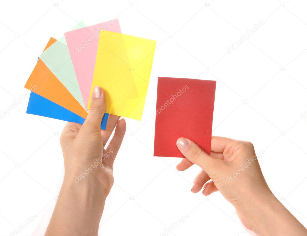 Multi-colored cards in hands — Stock Photo © Raolia #6560211