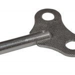 Old clock key winder isolated on white background, texture Stock Photo ...