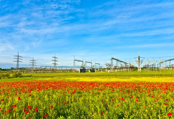Power plant and distribution station in beautiful landscape - Stock ...