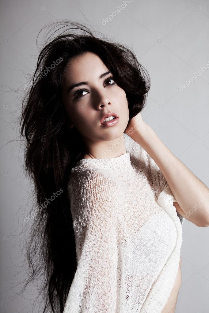 Young Fashion Model with Windswept Hair — Stock Photo © angietakespics ...