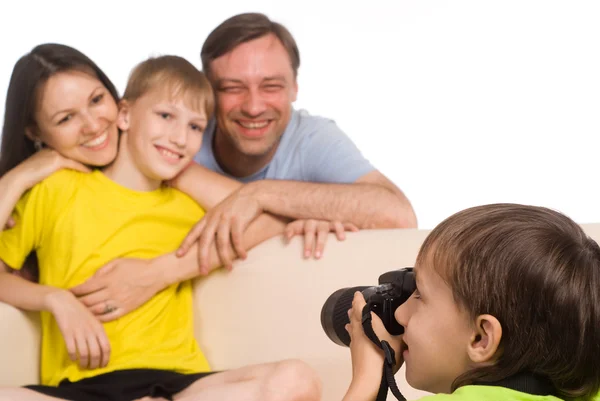 Happy family with camera Stock Photo by ©aletia 6353161