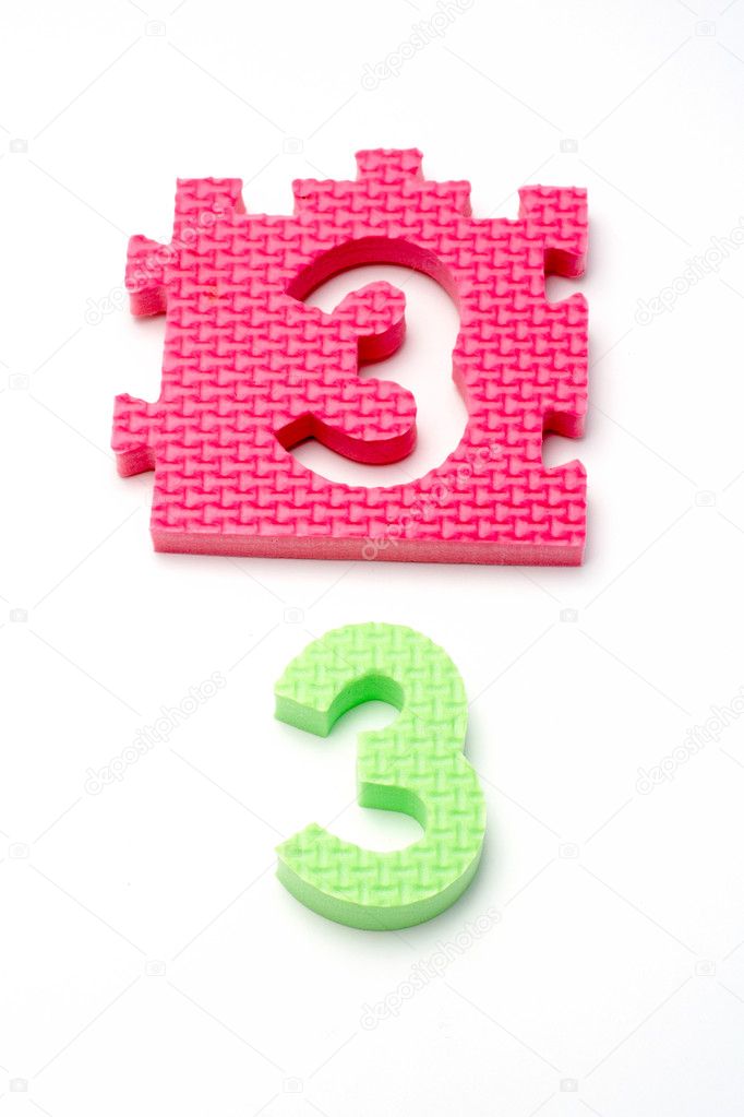 Number three puzzle mats. Focus on the front (small DOF) Stock Photo by ...