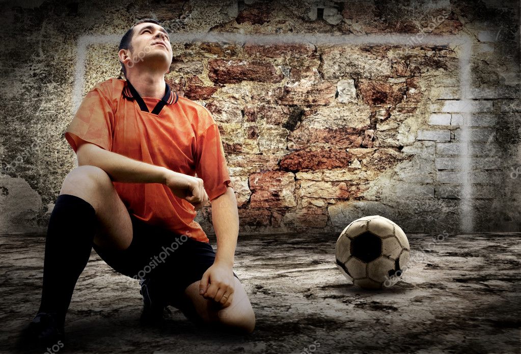 Football player and Grunge ball on the retro grunge background Stock ...