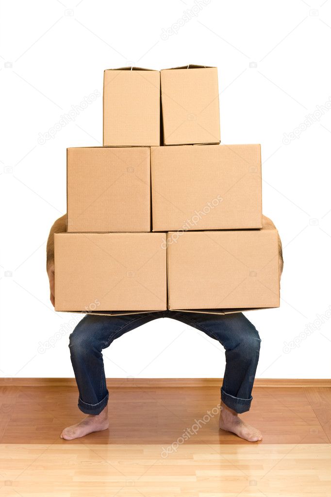 Man struggling while lifting lots of cardboard boxes — Stock Photo ...