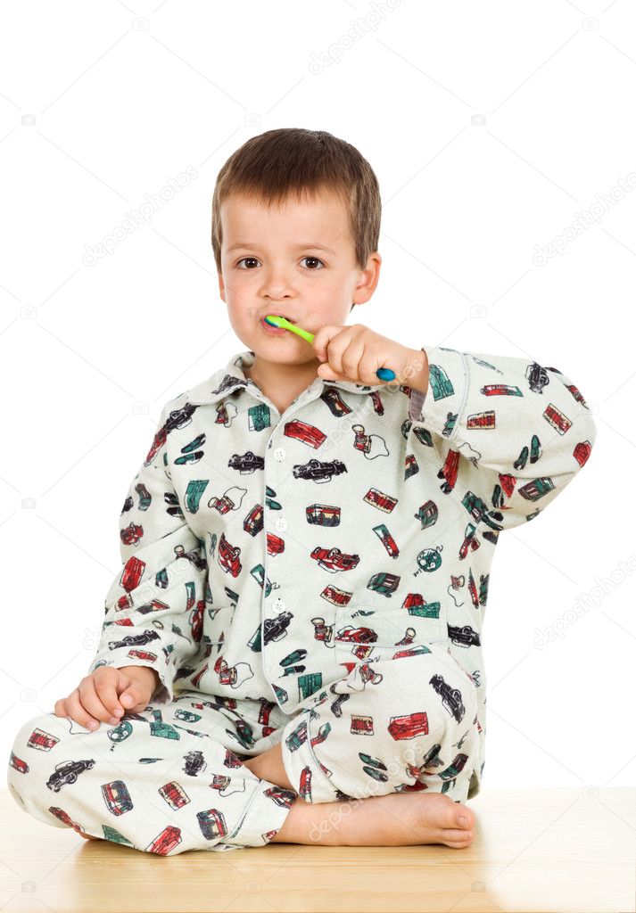 Kid brushing teeth before bedtime — Stock Photo © ilona75 #6409321