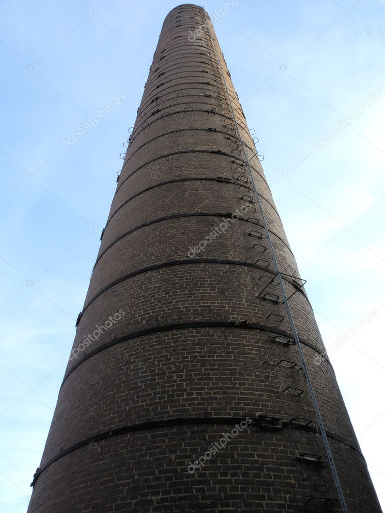 Brick chimney in a factory — Stock Photo © njaj #6606143