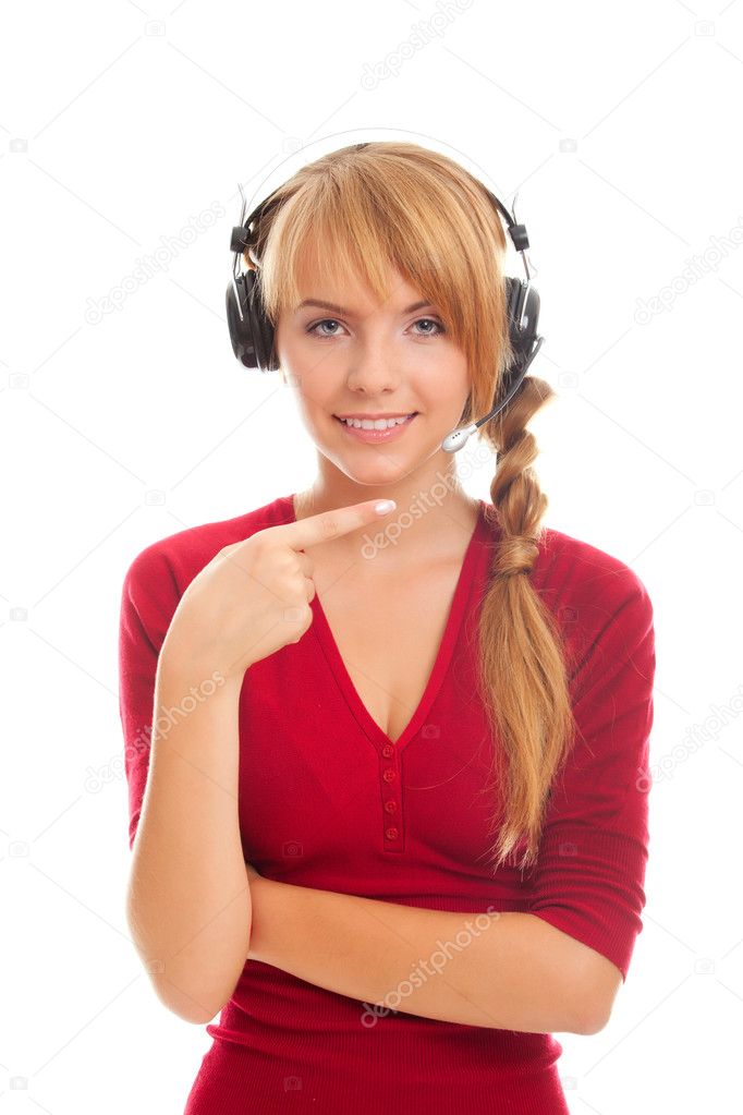 Young woman help line operator in headphones and points at the m Stock ...