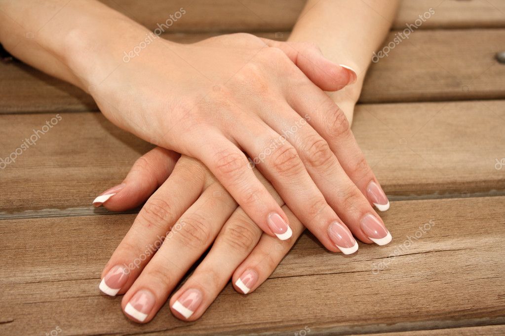 Woman hands with french manicure Stock Photo by ©belchonock 6660343
